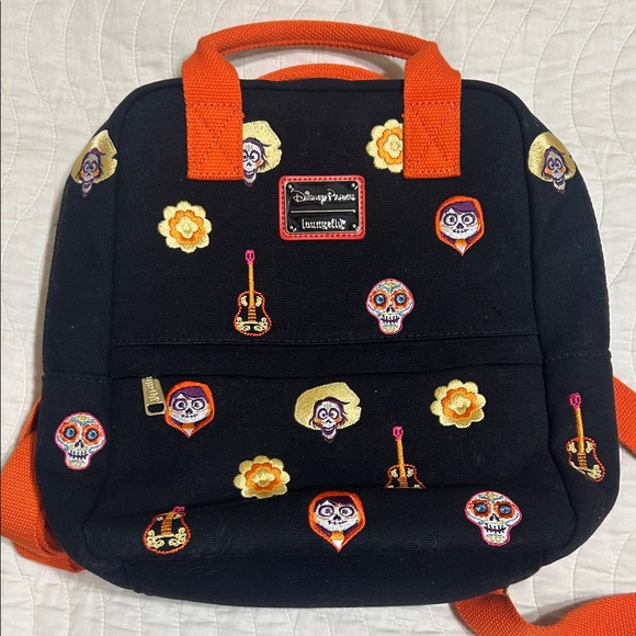 Disney | Bags | Disneypark Loungefly Coco Black And Orange Backpack ...